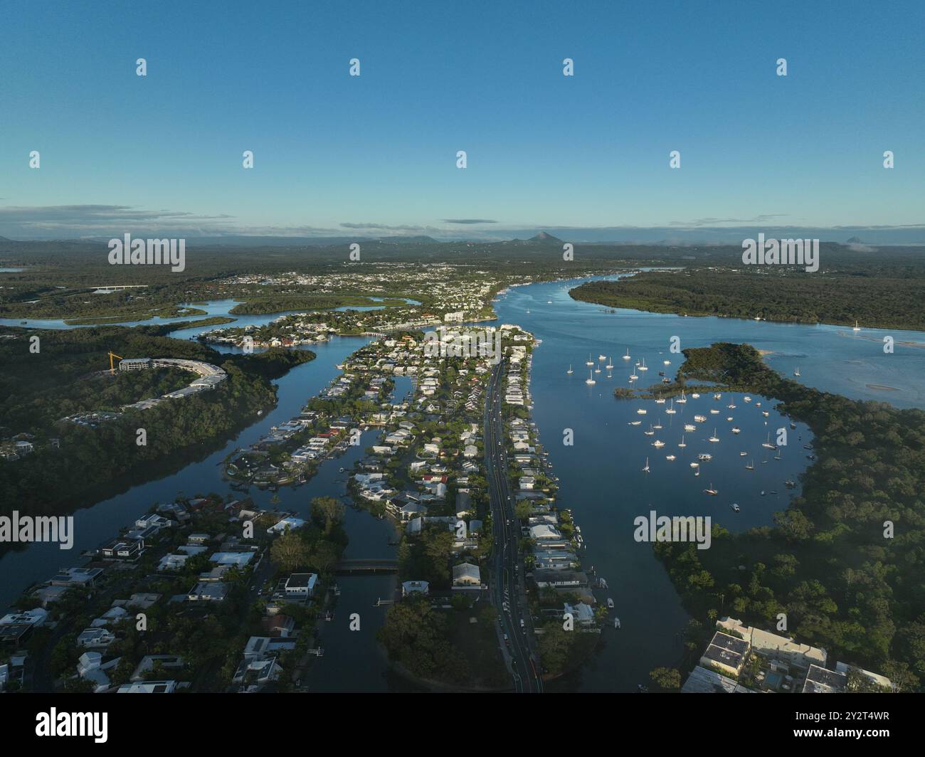 Aerial view of Noosa, Queensland, during sunrise sitting in the shadow ...