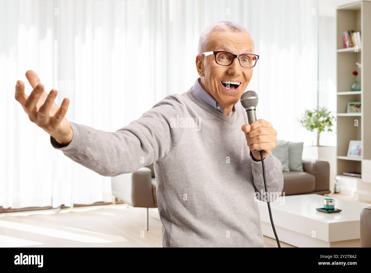 Elderly man singing on hi-res stock photography and images - Alamy