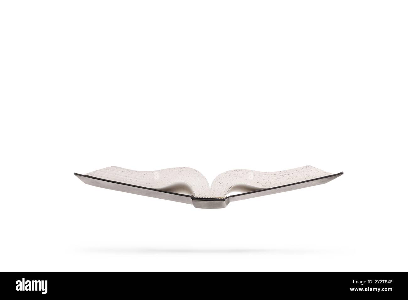 An open book floating in the air isolated on white background Stock Photo - Alamy