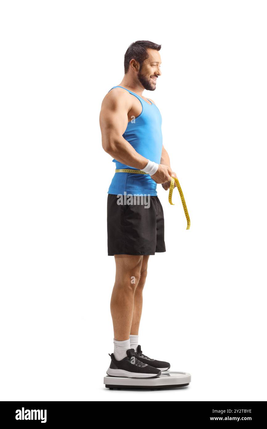 Fit man standing scale in hi-res stock photography and images - Alamy