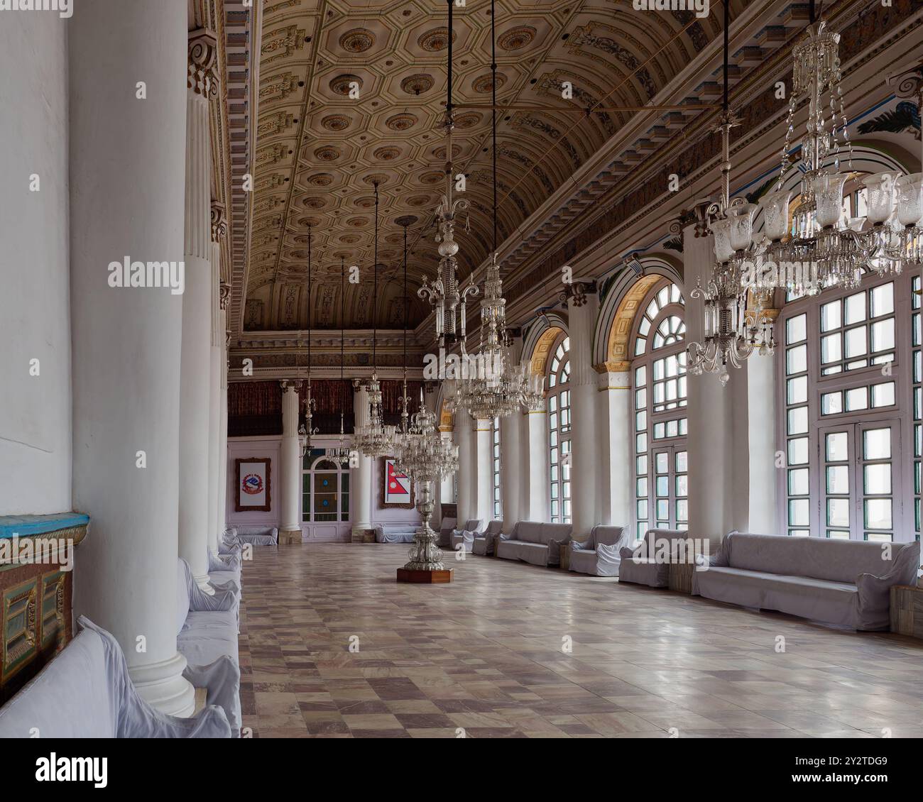 An opulent hall with chandeliers, large windows, and ornate ceiling ...