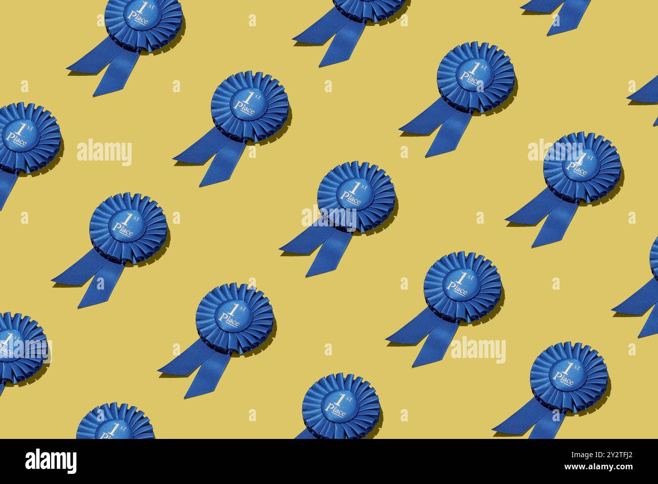 Pattern of blue first place ribbons on a yellow background ...