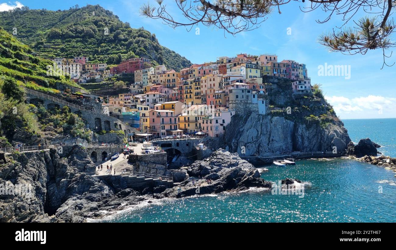 A picturesque view of Manarola, Cinque Terre, Italy with colorful ...