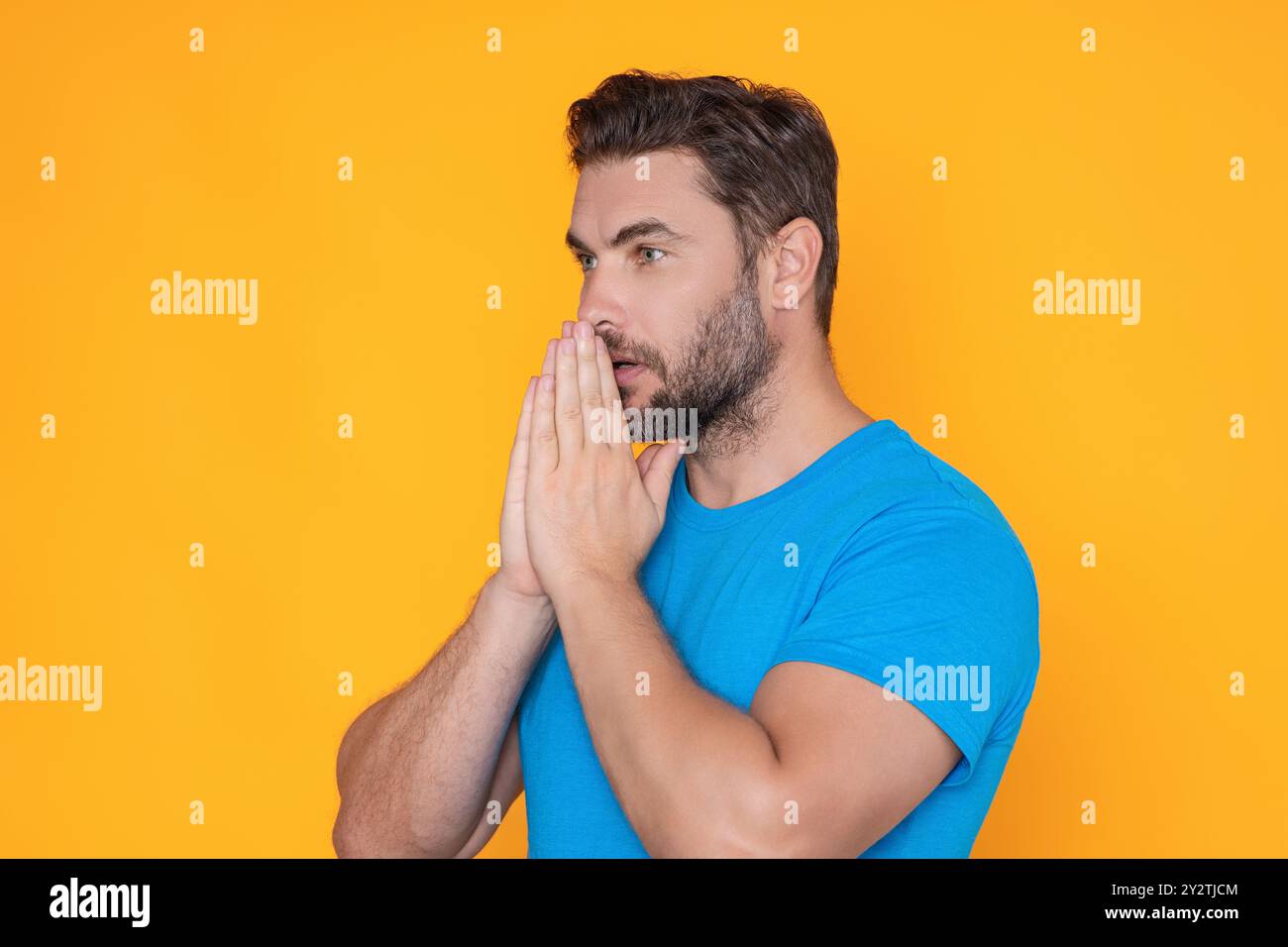 Man praying. Isolated portrait of male pray. Guy with praying hands ...