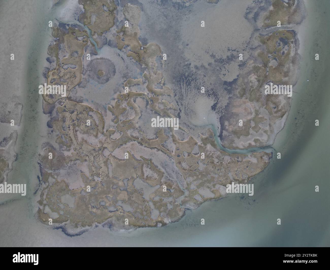 An aerial view of scenic rugged coastal rocky formations on the ocean ...