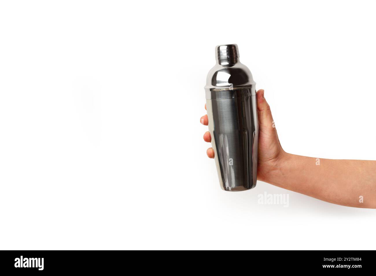 Man hands holding a cocktail shaker on a white background with copy space Stock Photo - Alamy