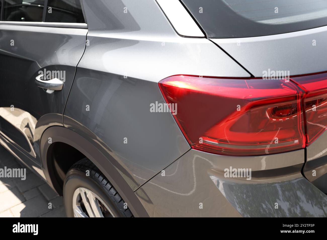 Modern grey car parked outdoors, closeup view Stock Photo - Alamy