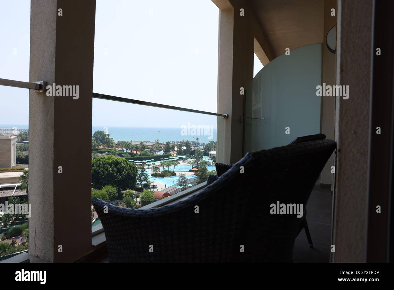 Rattan chairs on hotel balcony in luxury resort Stock Photo - Alamy