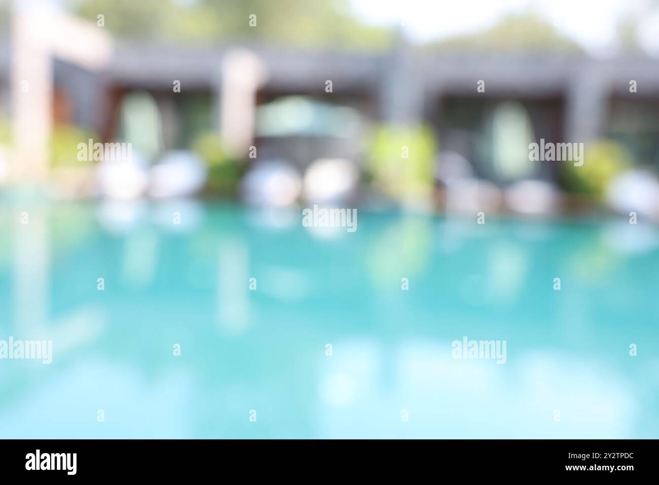 Blurred view of outdoor swimming pool at luxury resort Stock Photo - Alamy