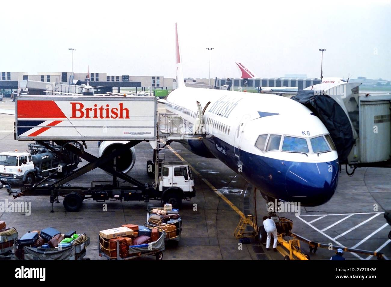 Pre flight loading of British Airways Boeing 737, Windsor Castle, Luton ? airport. 1980's. 35mm ...