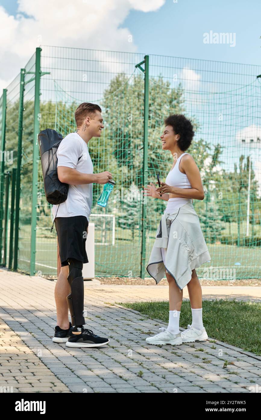Friends connect and motivate each other, man with prosthetic leg ...