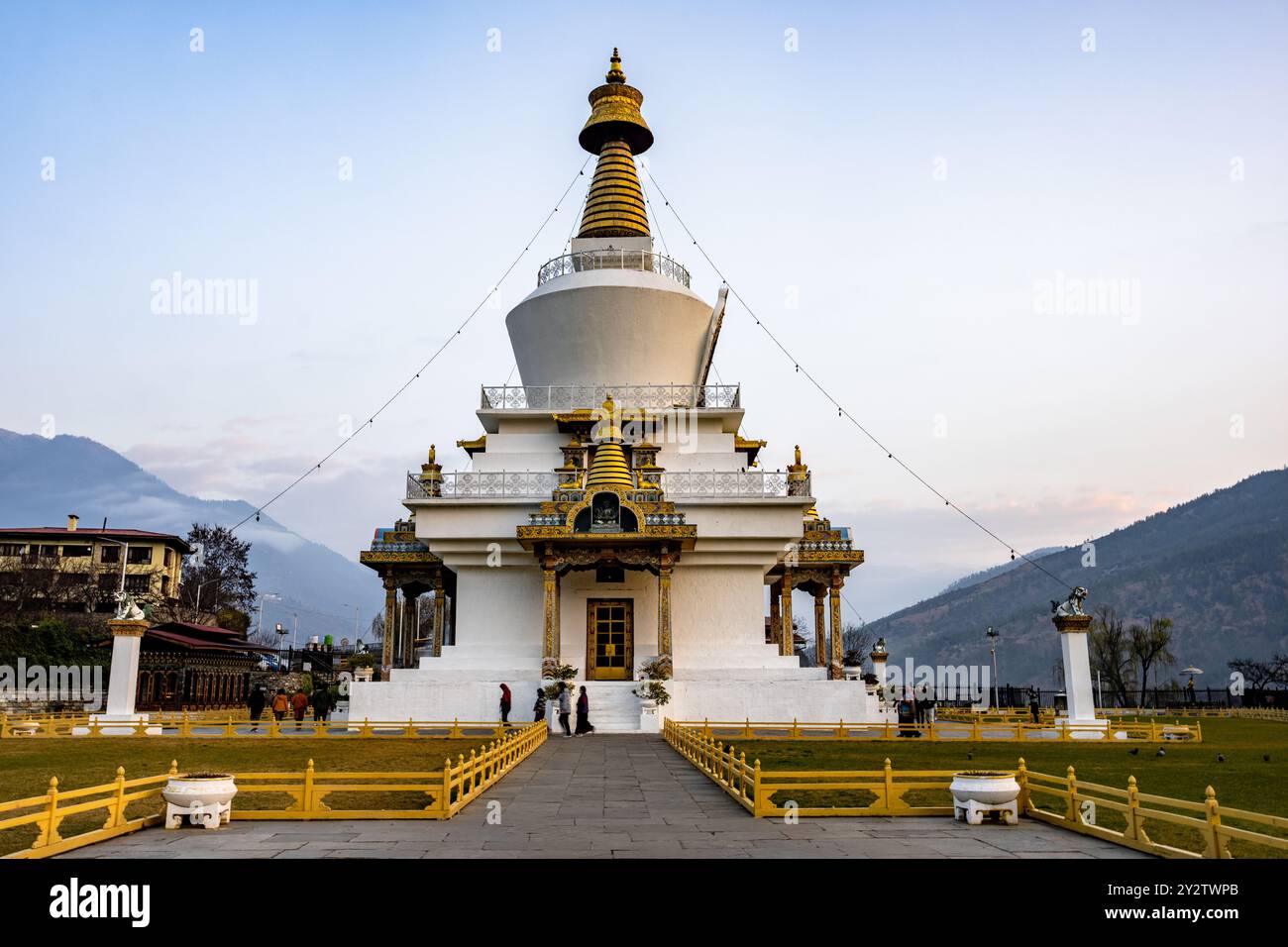 Early morning worship at the Memorial Stupa Chorten, a Tibetan Buddhist ...