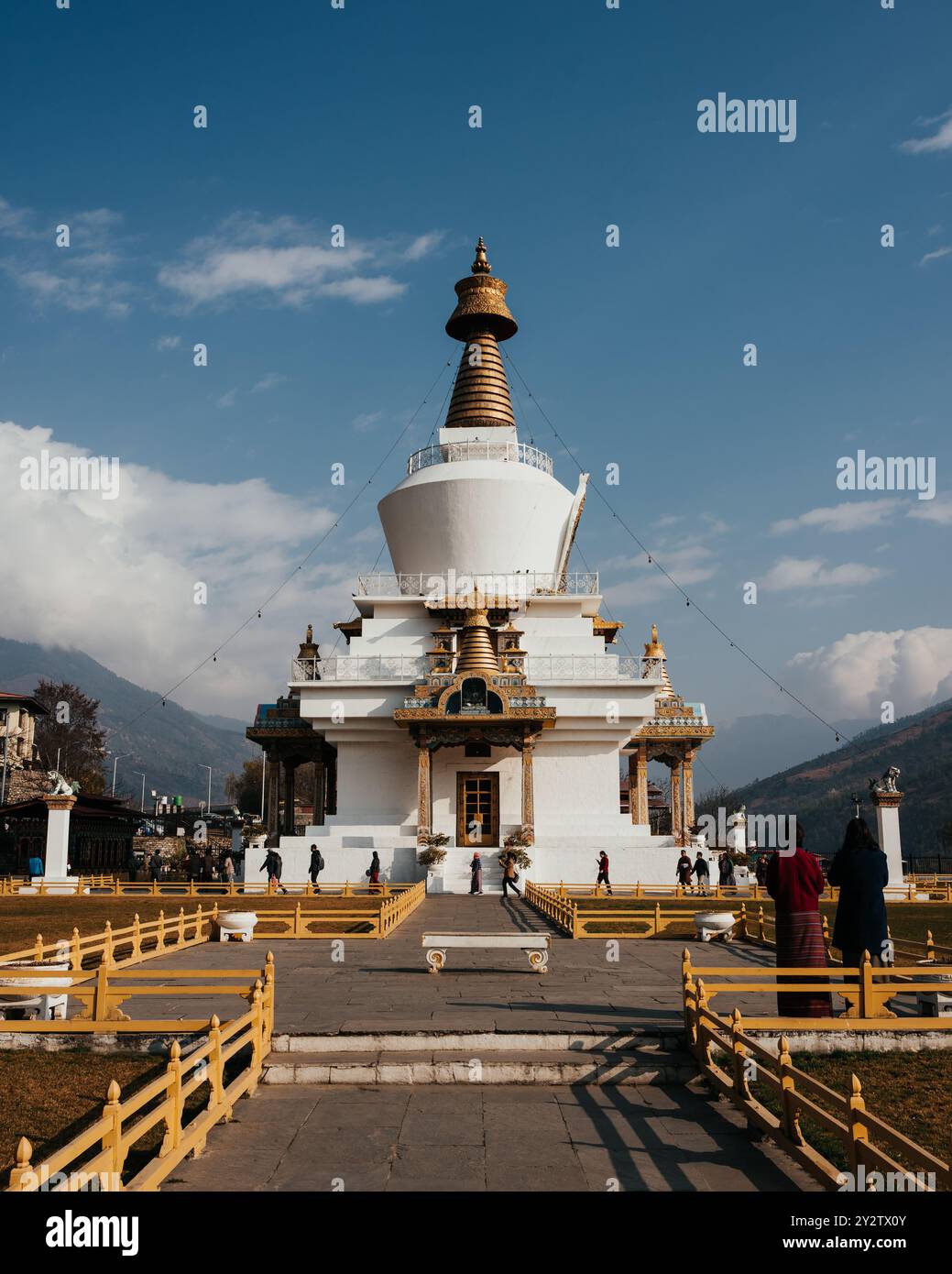Early morning worship at the Memorial Stupa Chorten, a Tibetan Buddhist ...