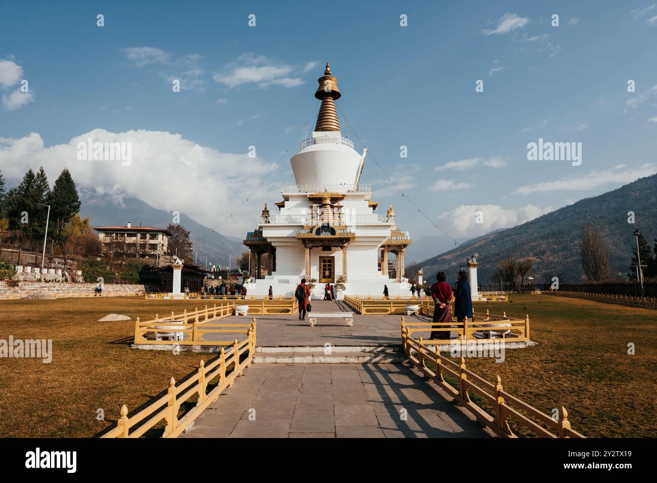 Early morning worship at the Memorial Stupa Chorten, a Tibetan Buddhist ...