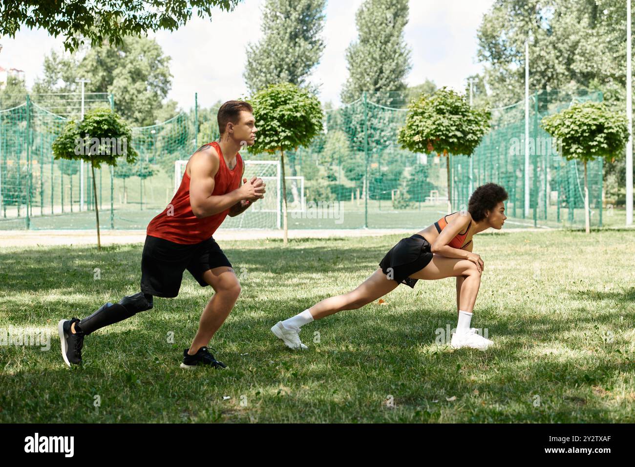 Two friends work out in a park, showcasing strength, determination, and ...