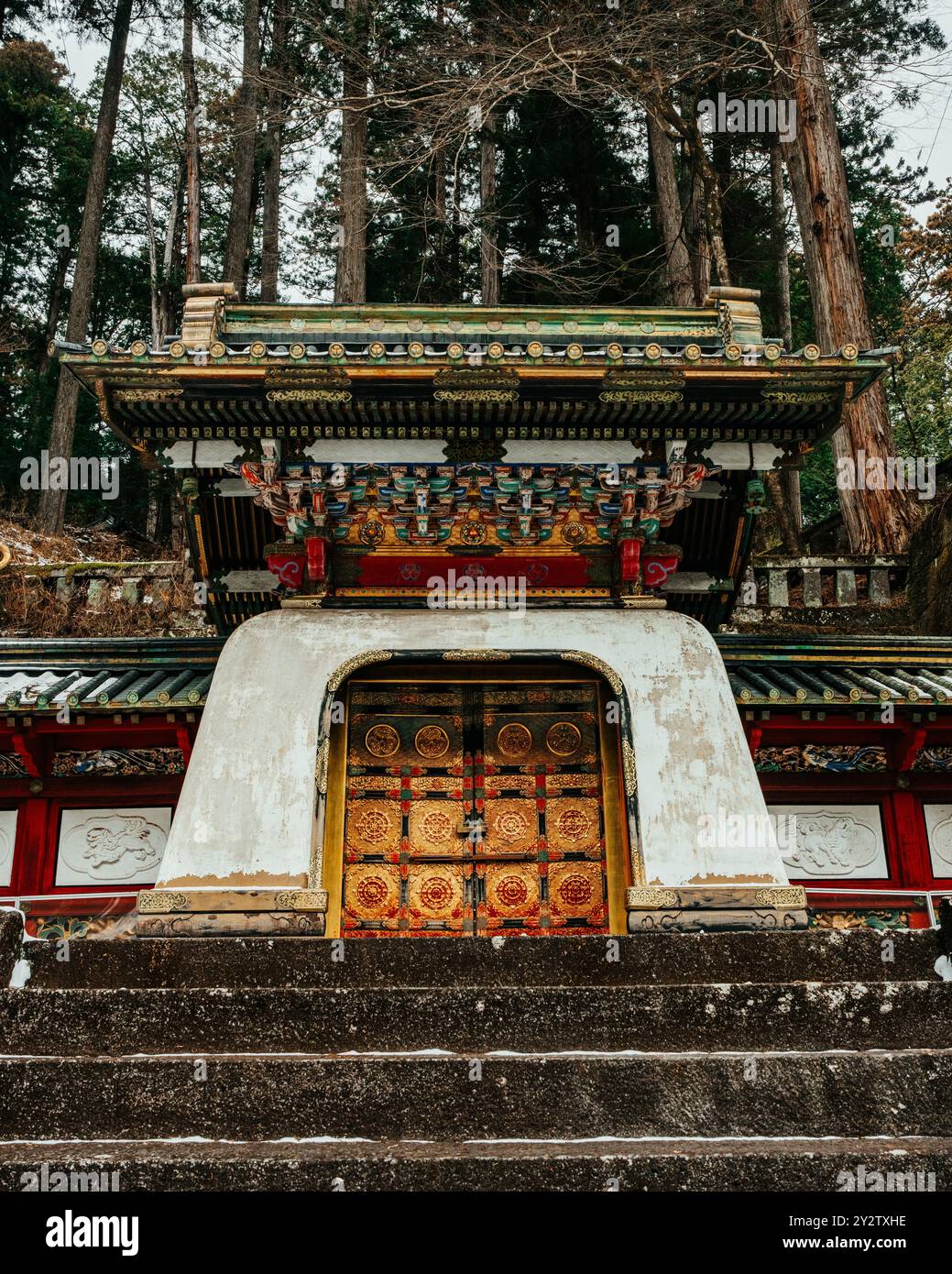 An ancient ornate shinto buddhist temple, shrine, and steps hidden in ...