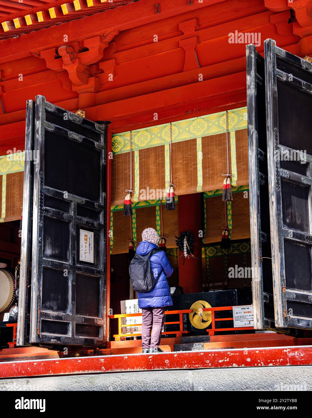 The Tourists and Buddhist Shinto worshipers at the ancient ornate ...