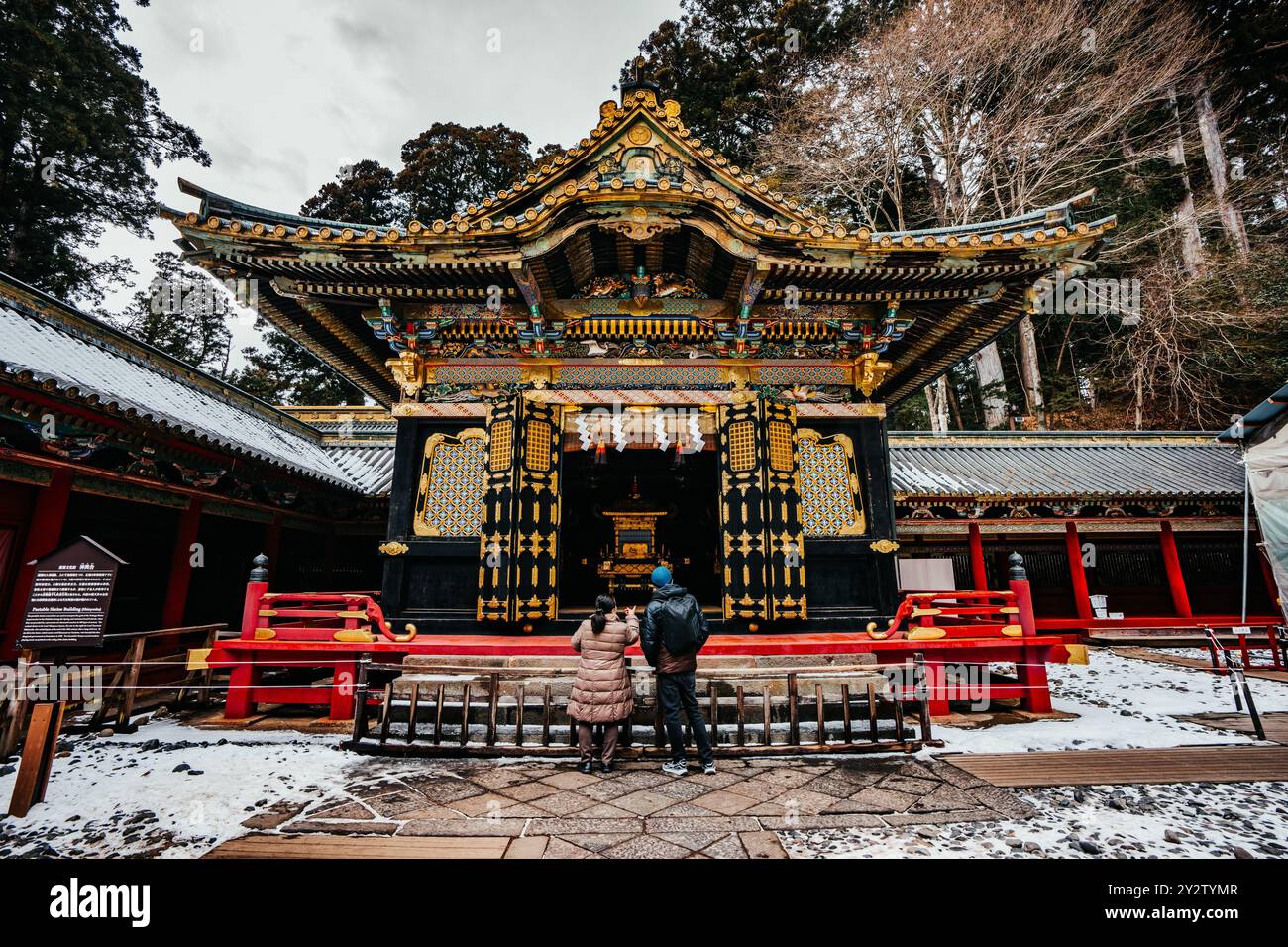 The Tourists and Buddhist Shinto worshipers at the ancient ornate ...