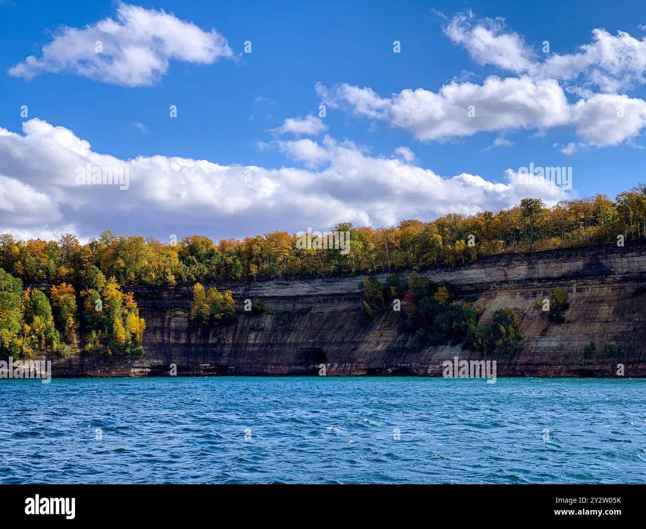 Scenic view of Pictured Rocks National Lakeshore with autumn foliage ...