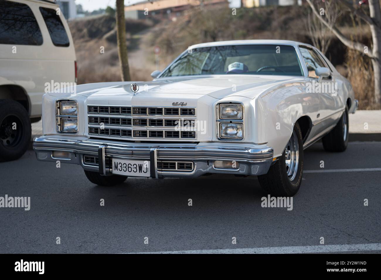 Front view of a classic second generation white Chevrolet Monte Carlo ...