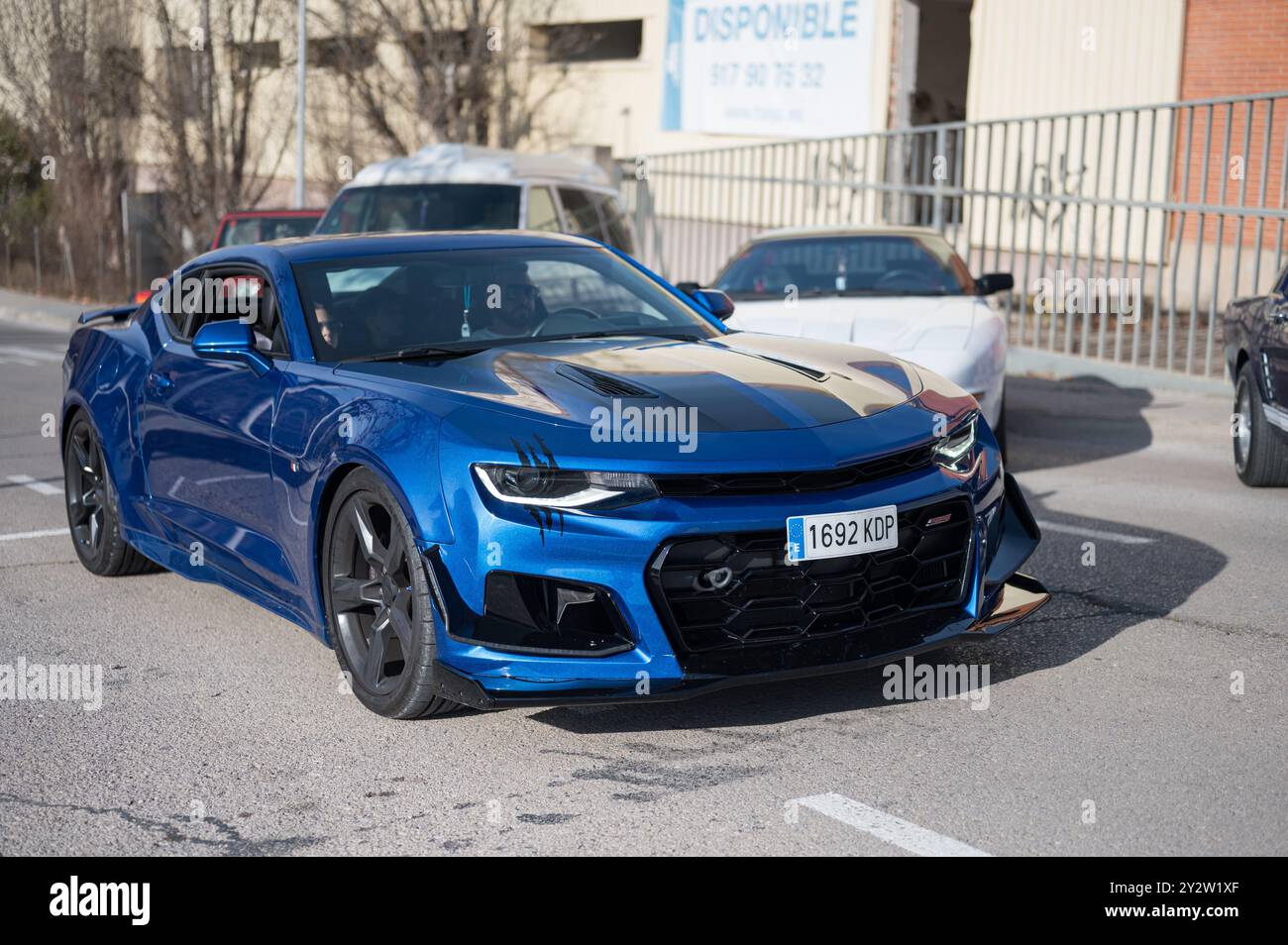 Front view of a spectacular American sports car, the blue sixth ...