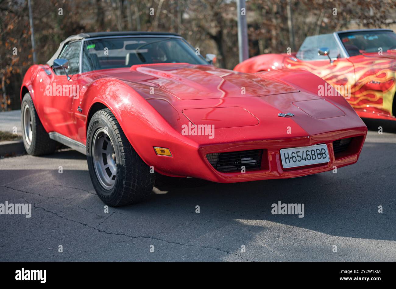 Front view of a classic red third-generation Chevrolet Corvette C3 ...