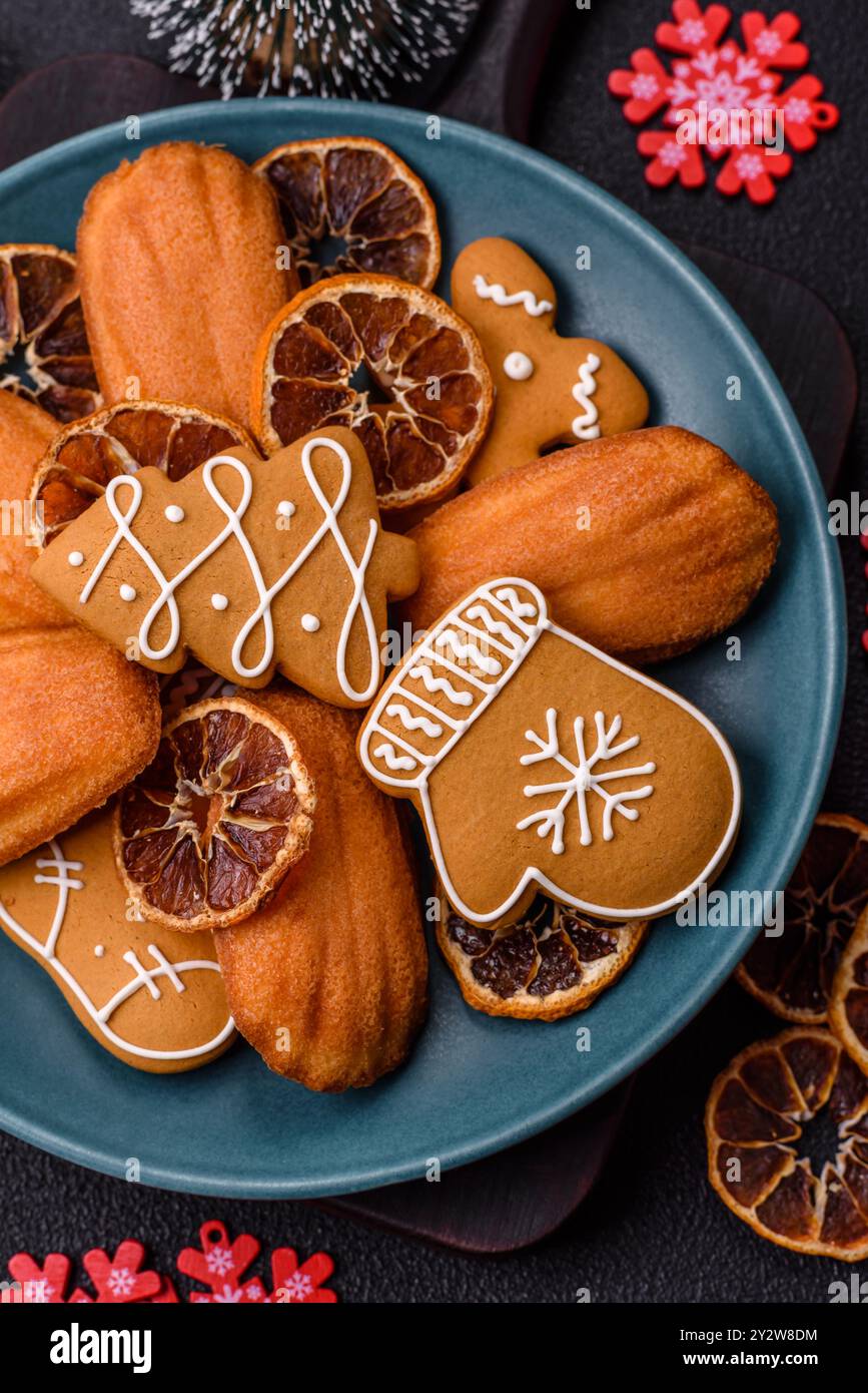 French classic madeleine sponge cake with elements of Christmas motifs ...