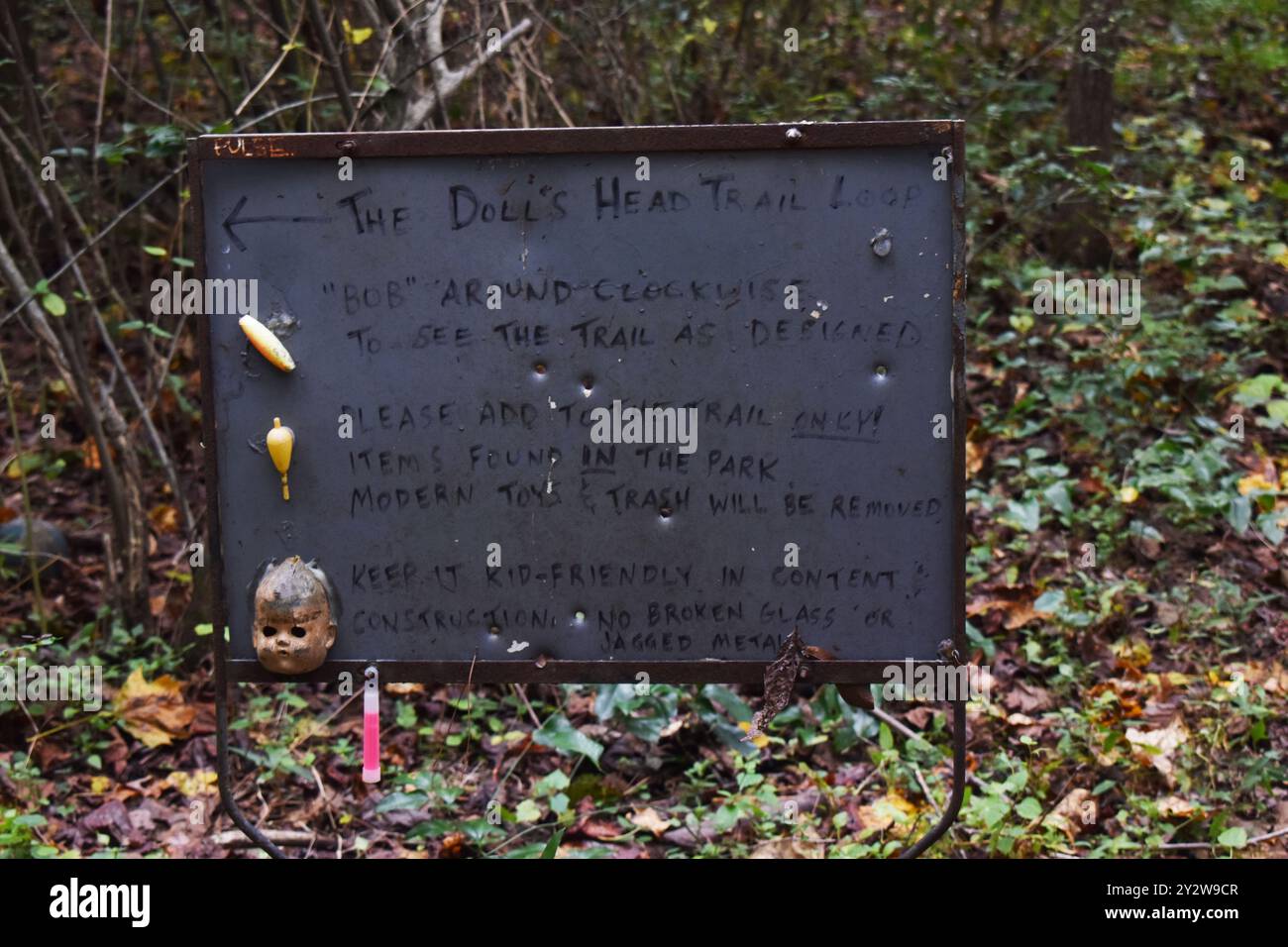 A sign for Doll's Head Trail in Constitution Lakes Park of Atlanta ...