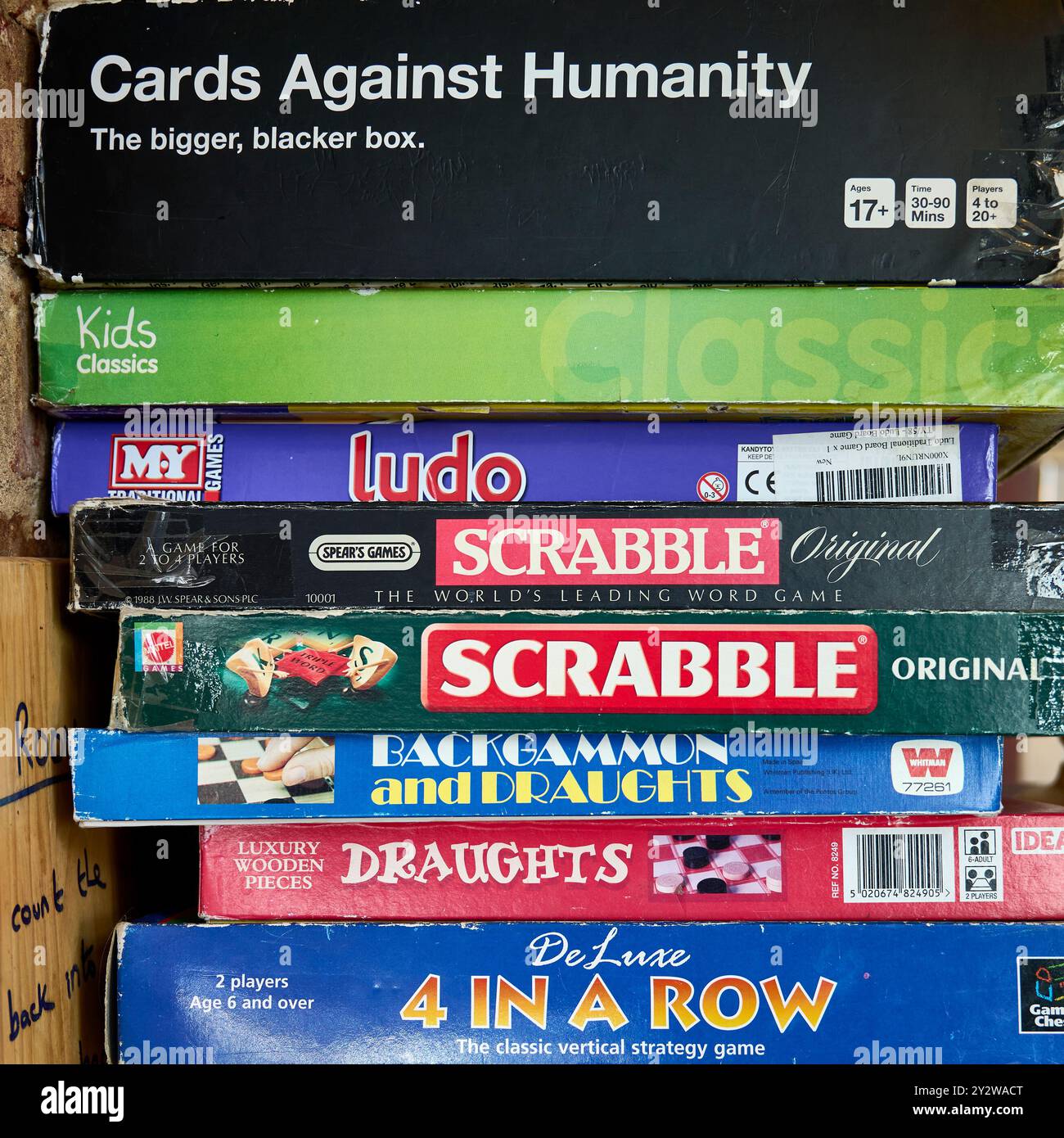Stack of board games played by all the family Stock Photo - Alamy