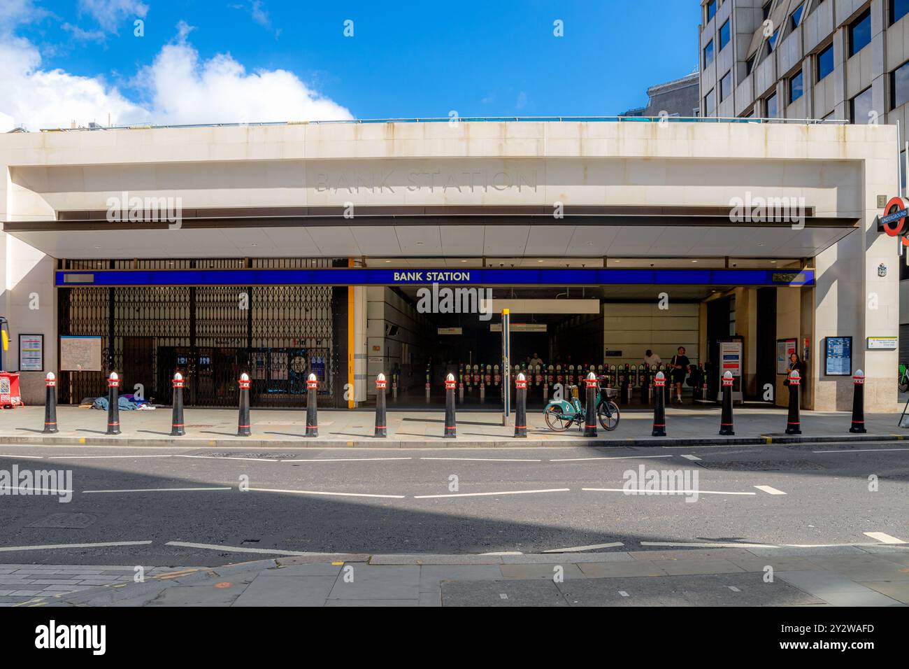People at the The Cannon Street entrance to Bank underground station in ...