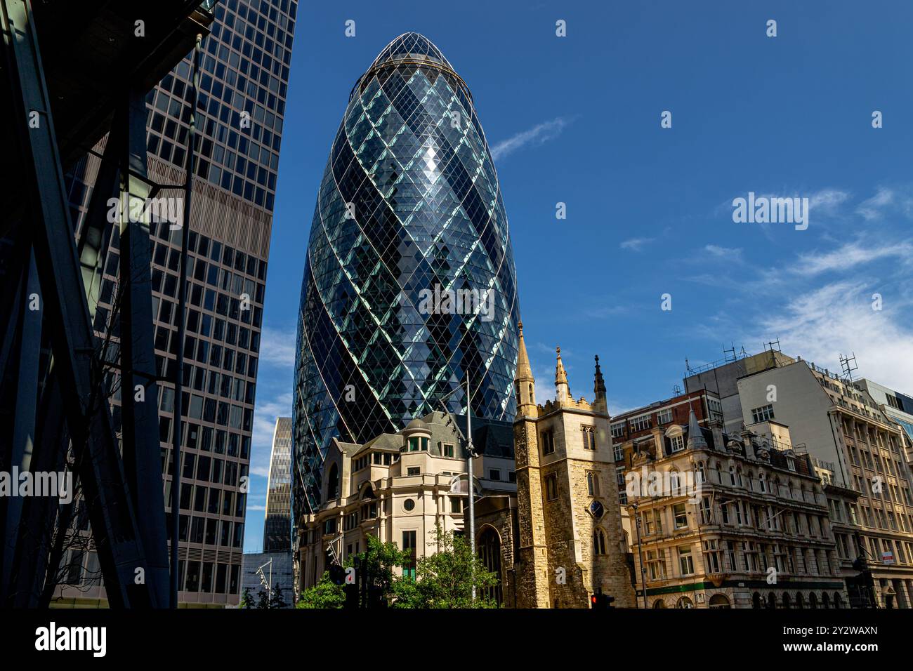 The Gherkin opened in April 2004 and St Andrew Undershaft Church side ...
