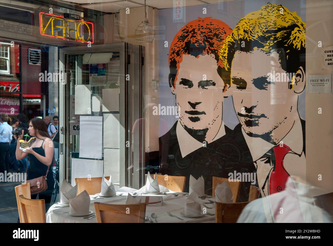 Prince Harry and Prince William together, their portraits painted onto ...