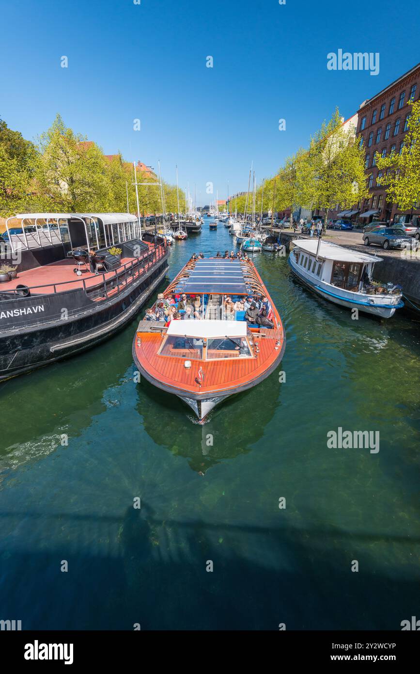 Copenhagen, Denmark - May 12 2017: Sightseeing boat passing under a ...