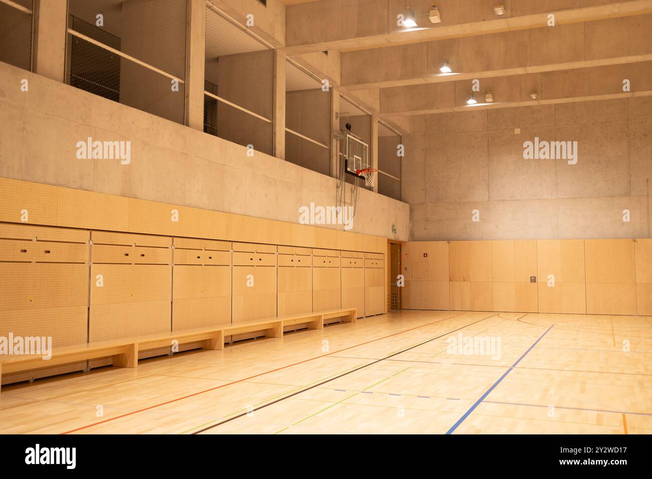 An empty indoor gymnasium with wooden benches Stock Photo - Alamy