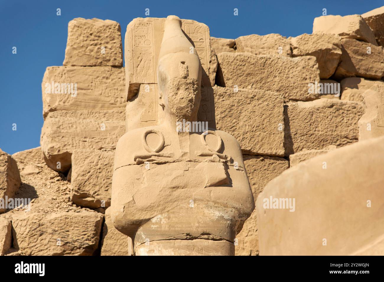 Statues of Osiris with the key of life are a prominent feature of the ...