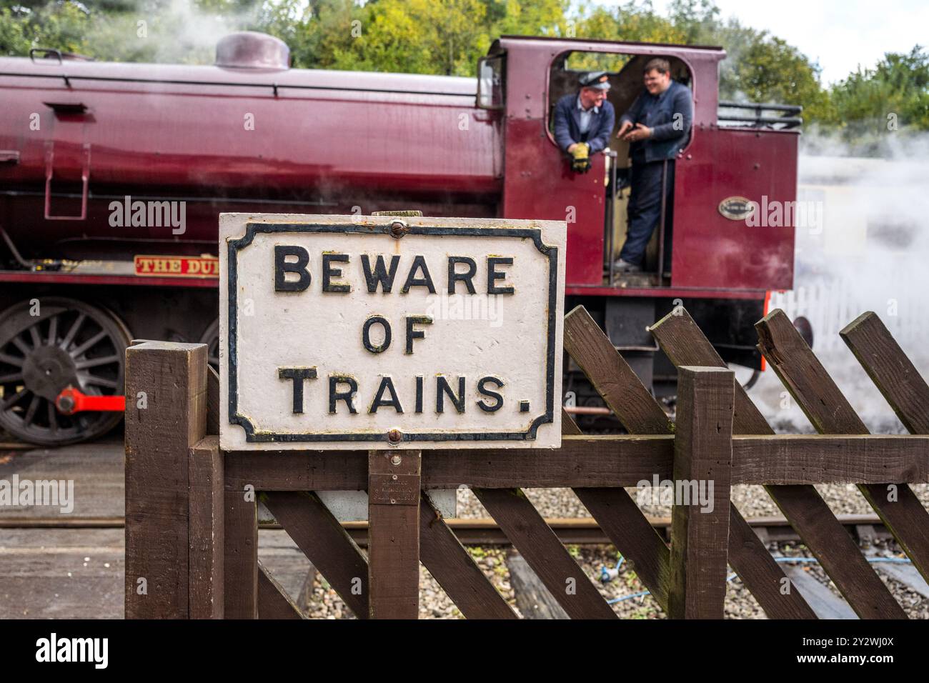 Beware of trains warning sign at the footpath crossing at the ...
