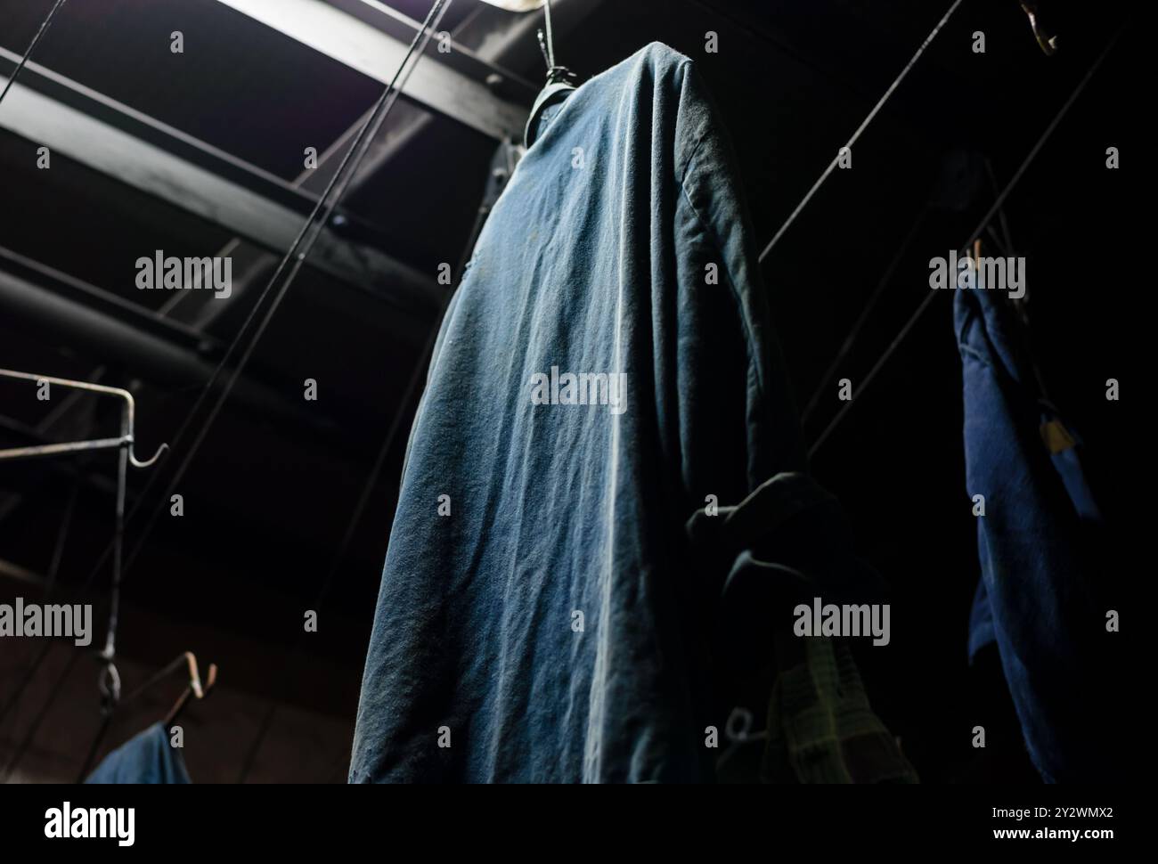 Vintage Denim Miner's Work Jacket Hanging in the Cloakroom. Color image ...