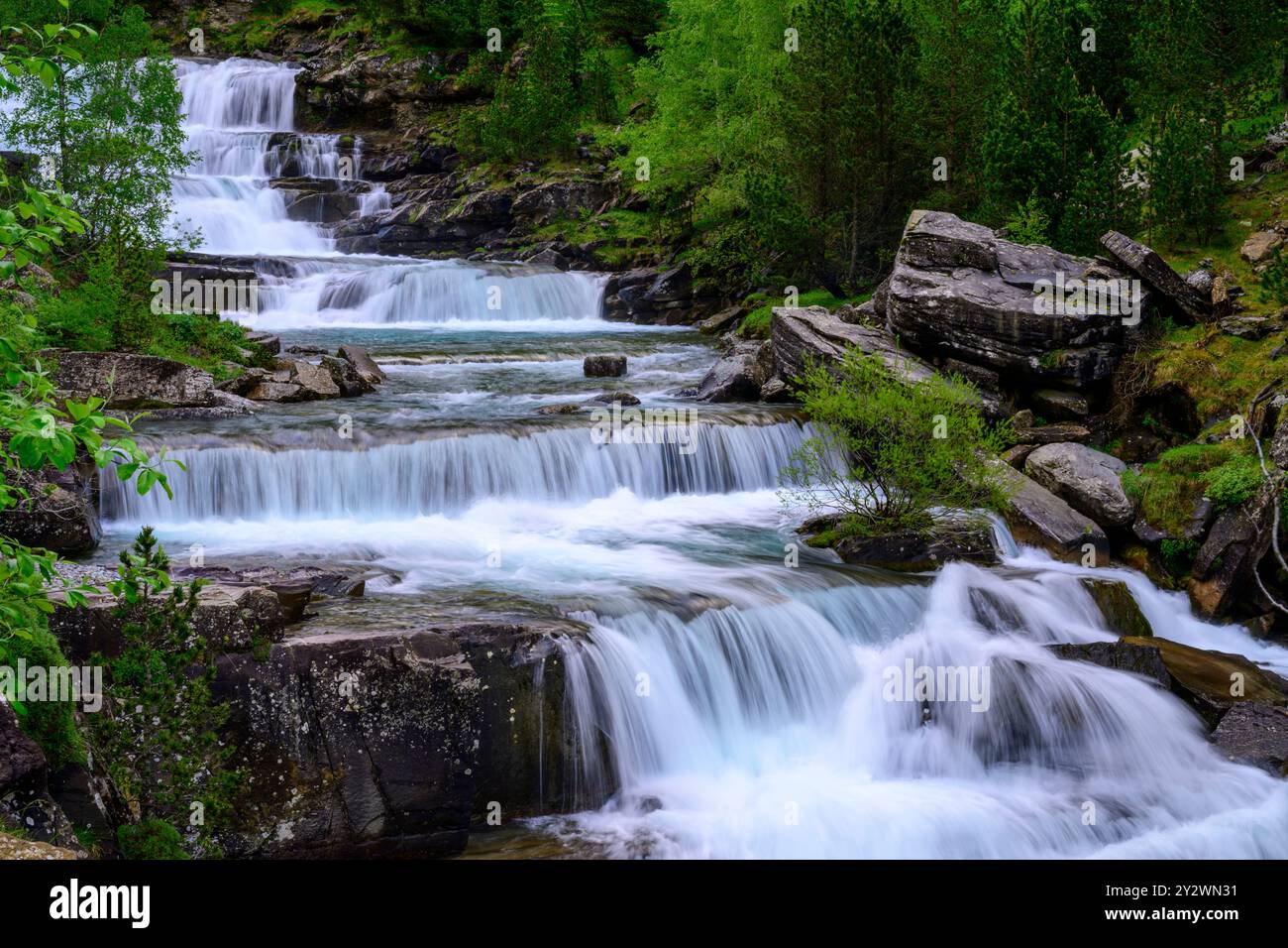 Gradas de Soaso waterfall in the river Rio Arazas in Ordesa Canyon ...