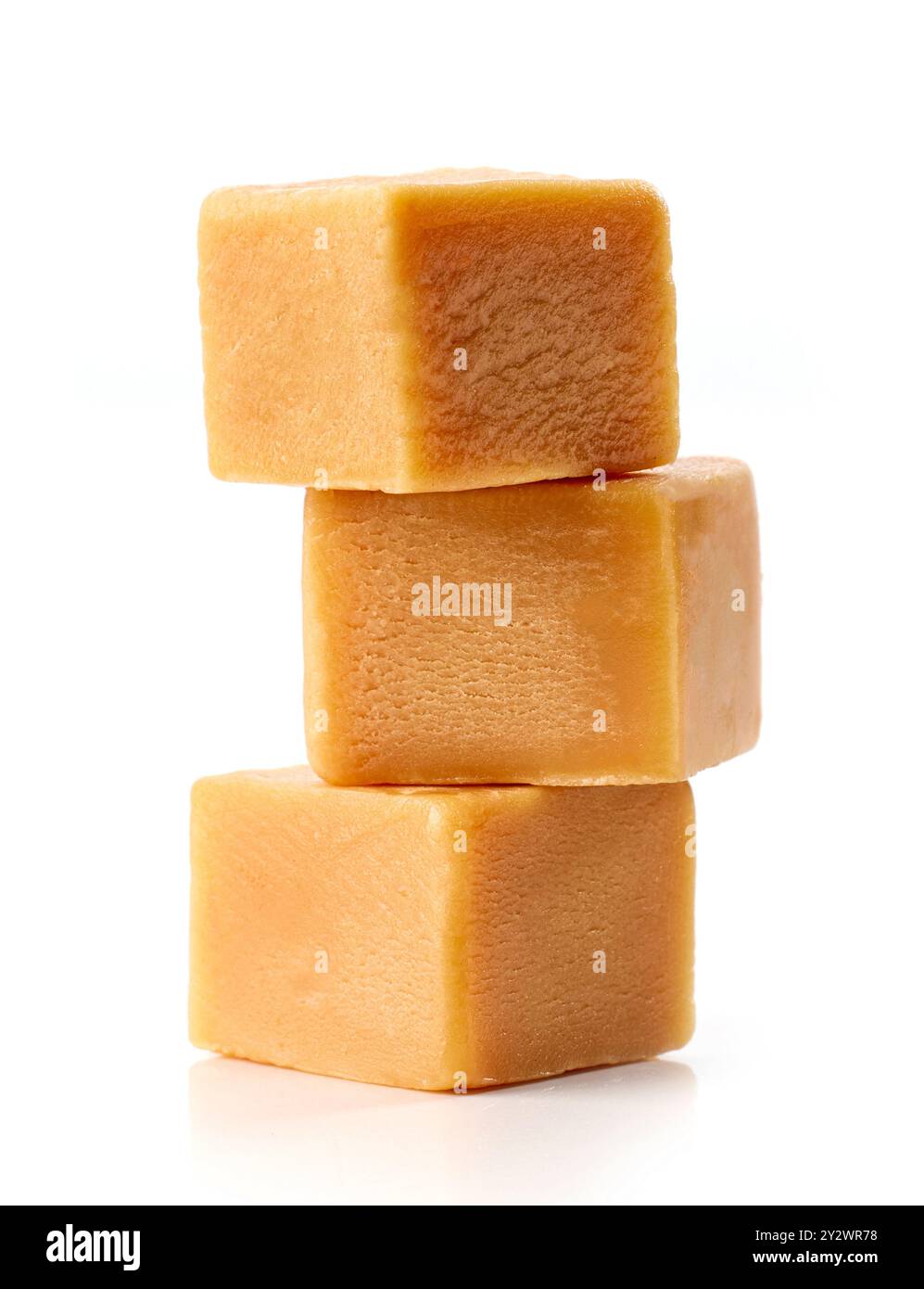 stack of caramel candies isolated on white background Stock Photo - Alamy