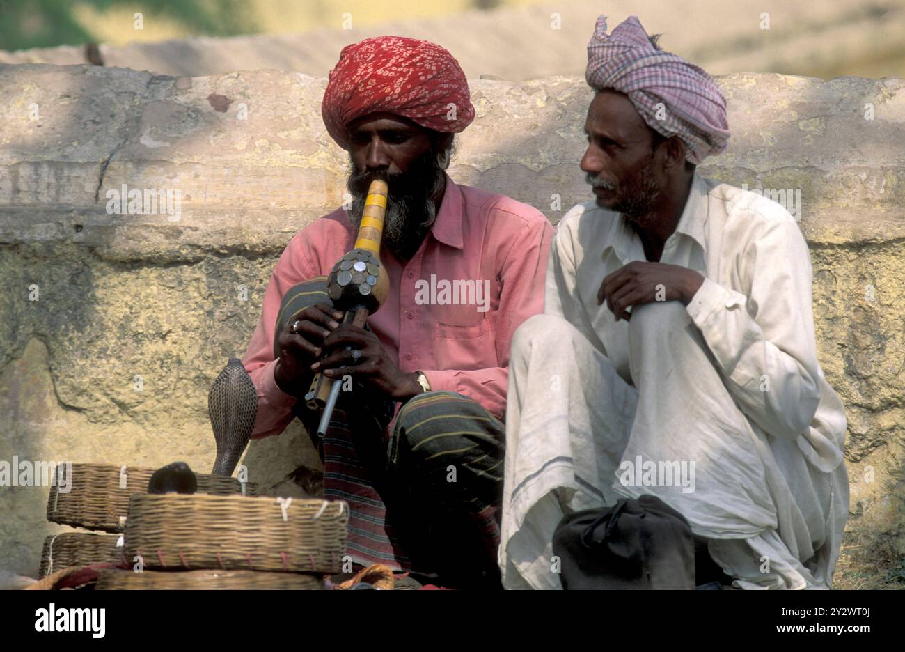 a indian Snake charmers at a market street in the City of Jaisalmer in ...