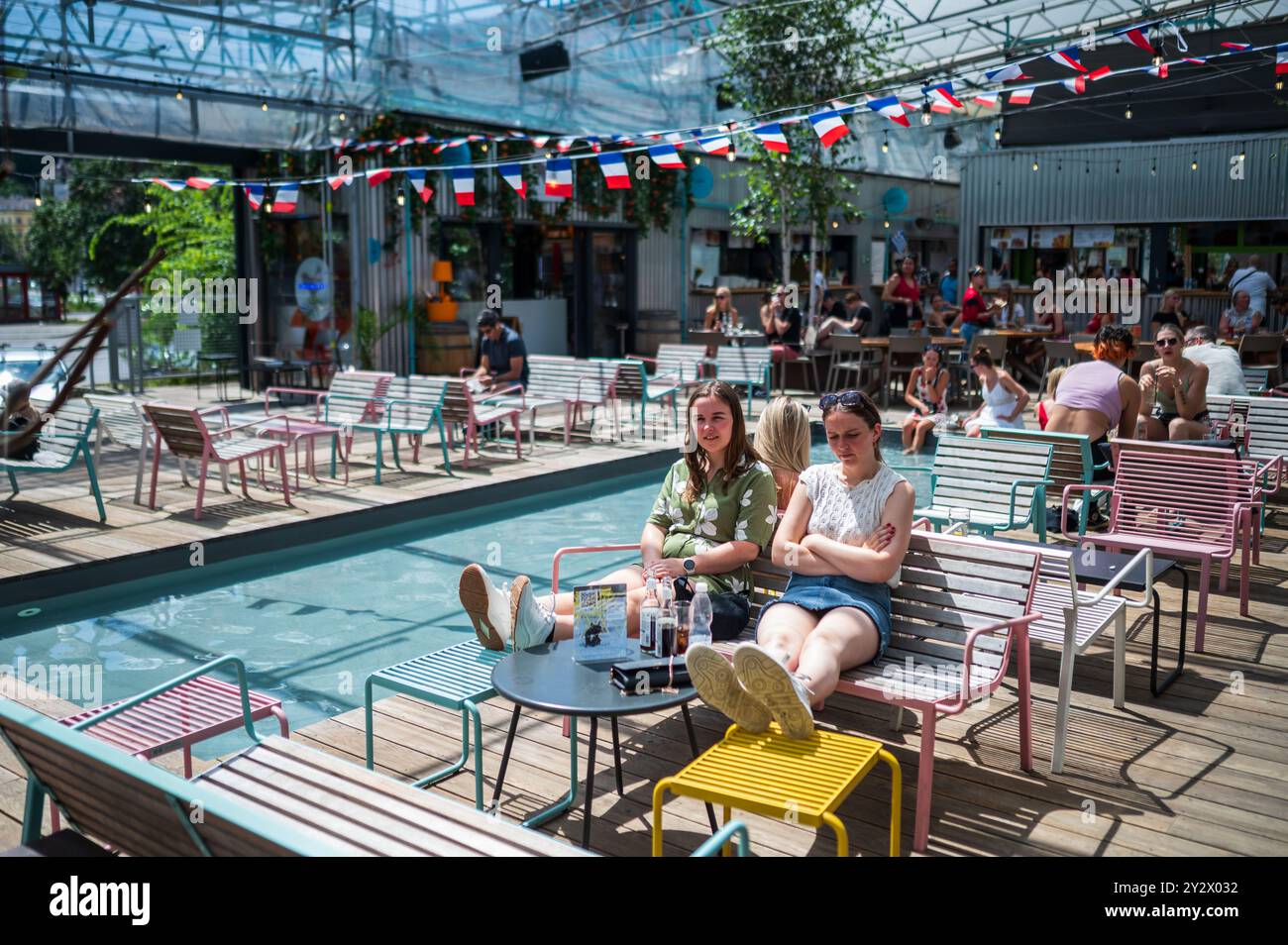 Clients refresh by the pool at Manifesto Market, a must-visit cultural ...
