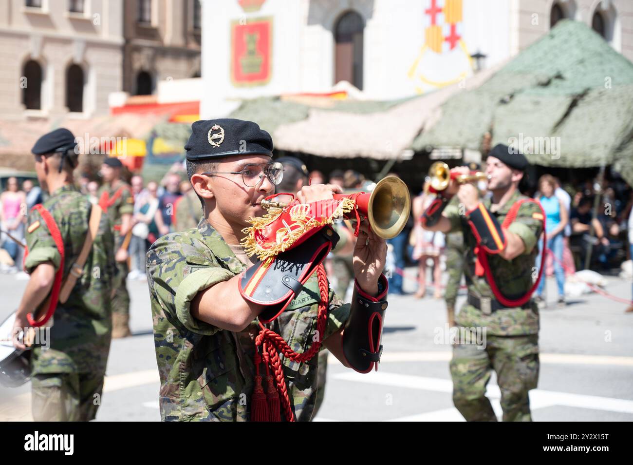 tank soldier playing trumpet during the parade of the military band of ...