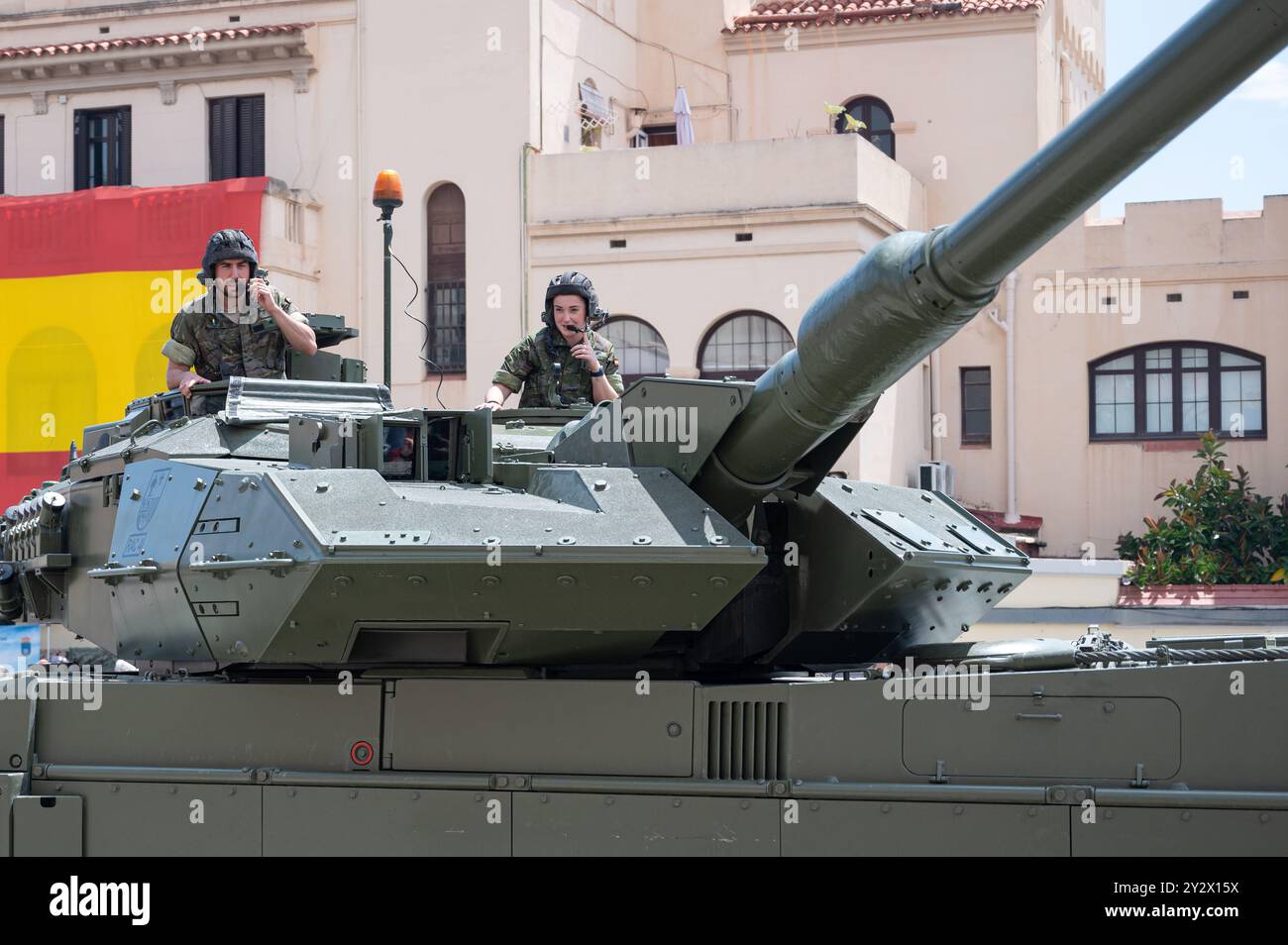 Detail of two tankmen peeking through the hatches of the turret of the ...