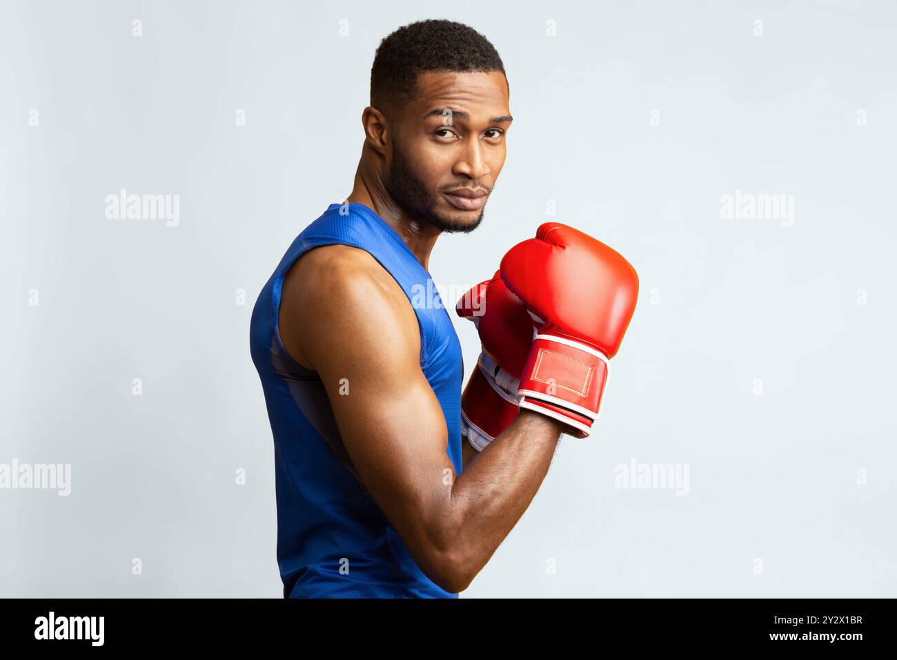 Athletic african fighter demonstrating classical boxing stance Stock ...
