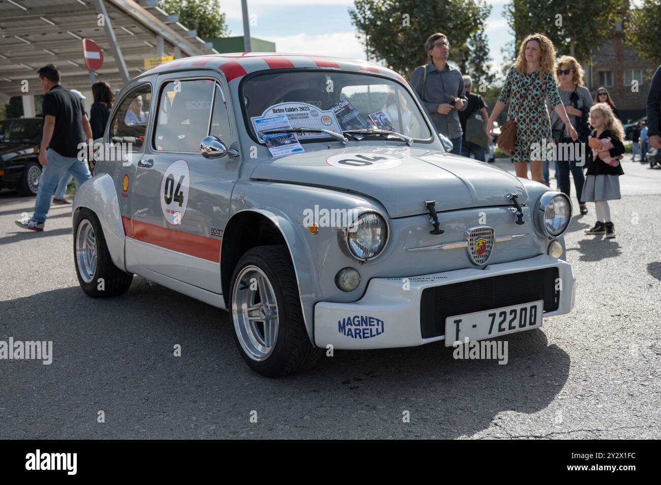 Front view of the classic small sports car Fiat Abarth 1000 TCR Gruppo 2. It is gray with the ...