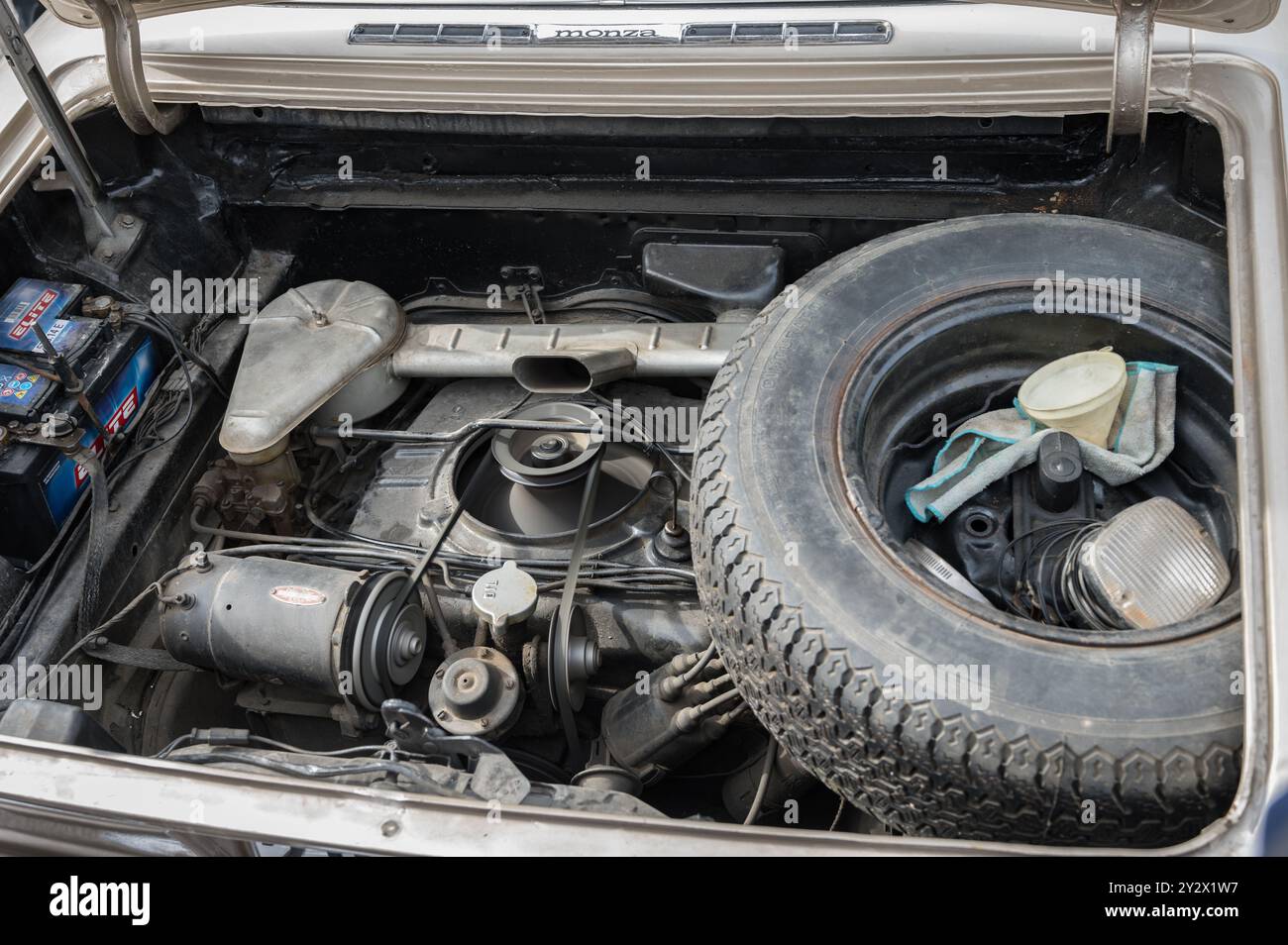 Engine compartment of an old Chevrolet Corvair Monza. It is a rear ...