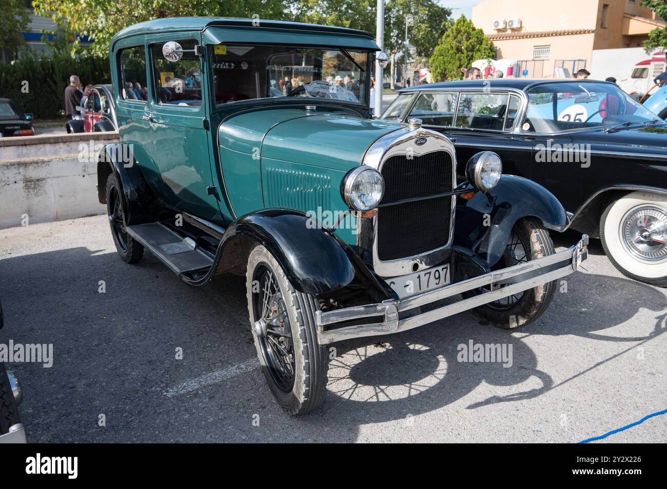 Front view of the historic green Ford Model A 4-door hardtop car with ...