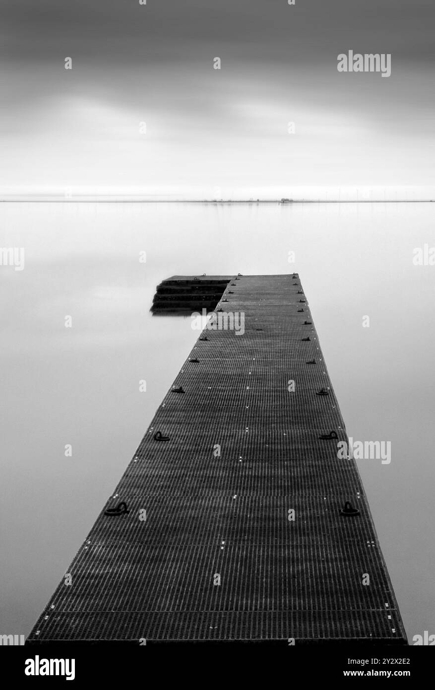 Long Exposure of Wooden Jetty at West Kirby Marine Lake, UK Stock Photo ...