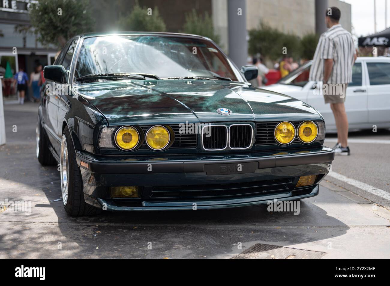 green luxury sports car at a car meeting. BMW E34 520is 5 series green ...