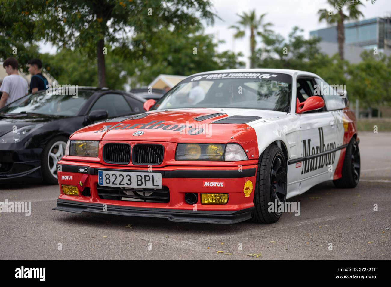 Nice classic BMW E36 red and white Marlboro Stock Photo - Alamy